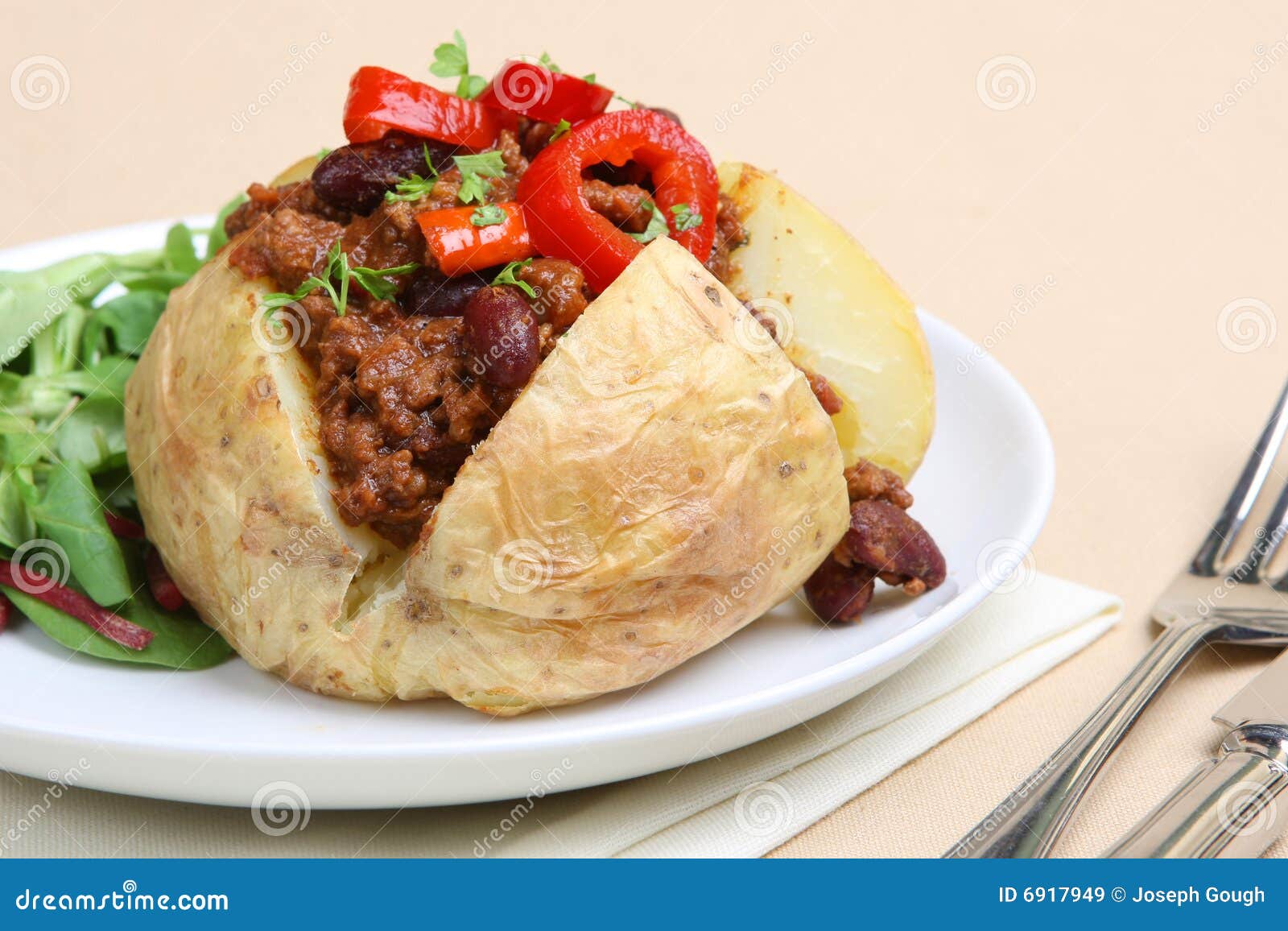 Baked Potato with Chilli stock image. Image of fork, jacket - 6917949
