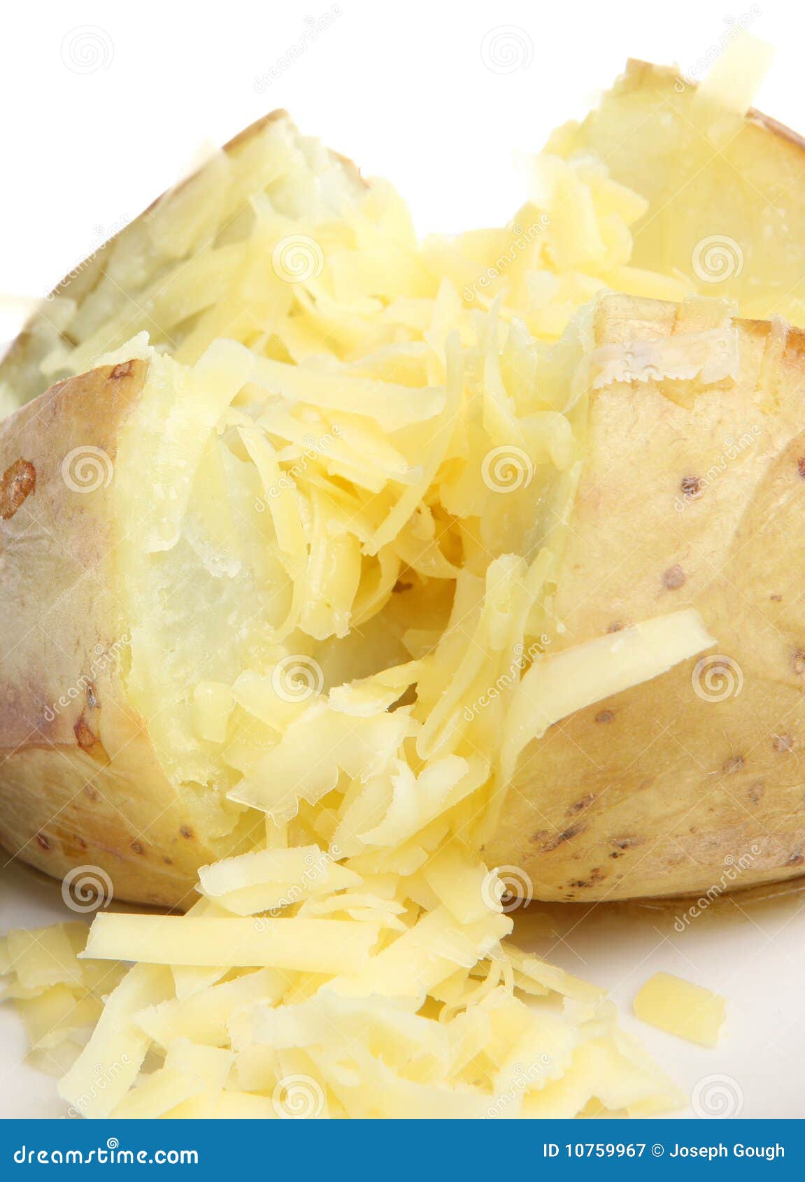 Baked Potato with Grated Cheese Stock Image - Image of food, plate ...
