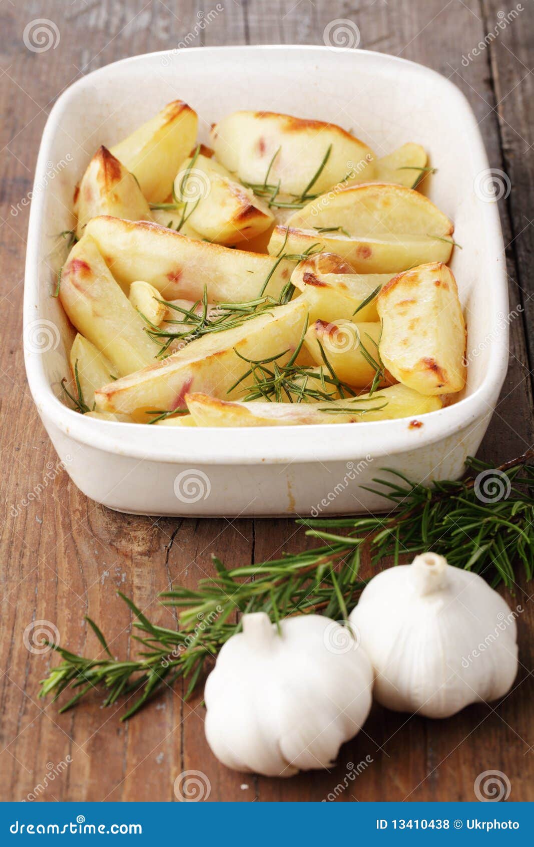 Baked potato with spice stock photo. Image of dish, rosemary - 13410438