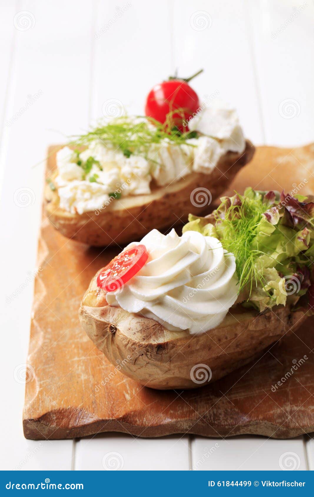 Baked potatoes with cheese stock image. Image of cheese - 61844499