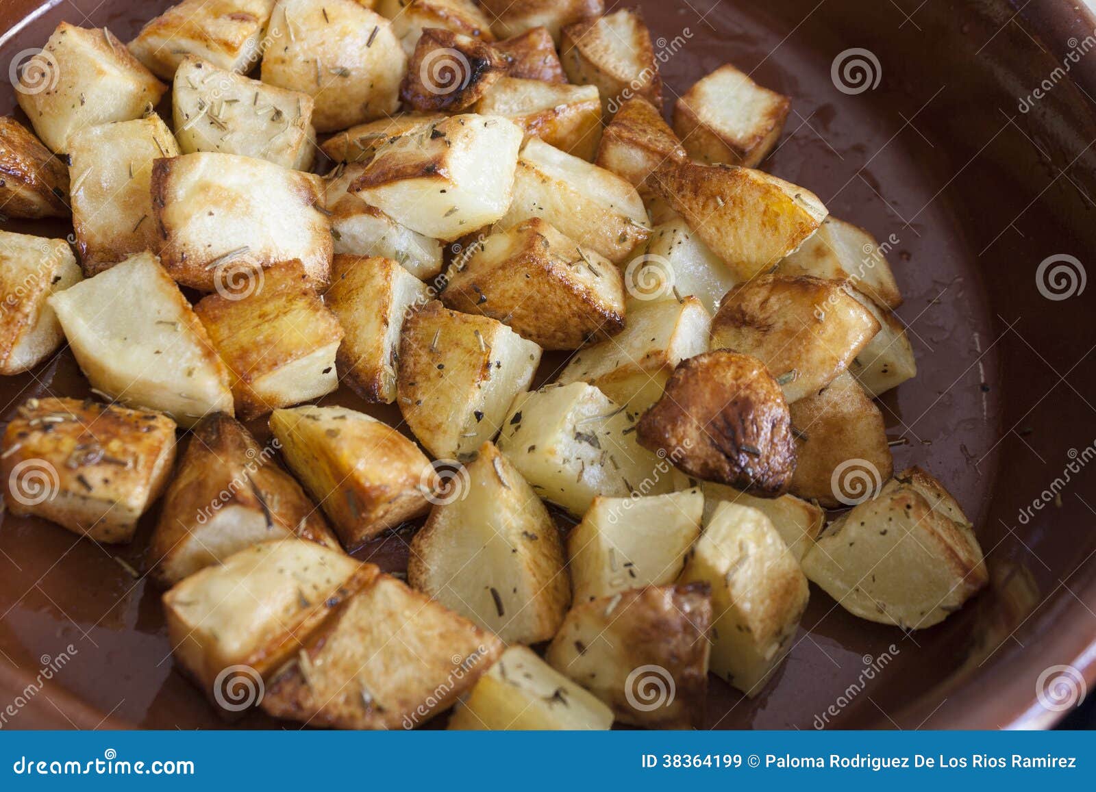 Baked Potatoes, Cut into Pieces Stock Image - Image of olive, cuisine ...