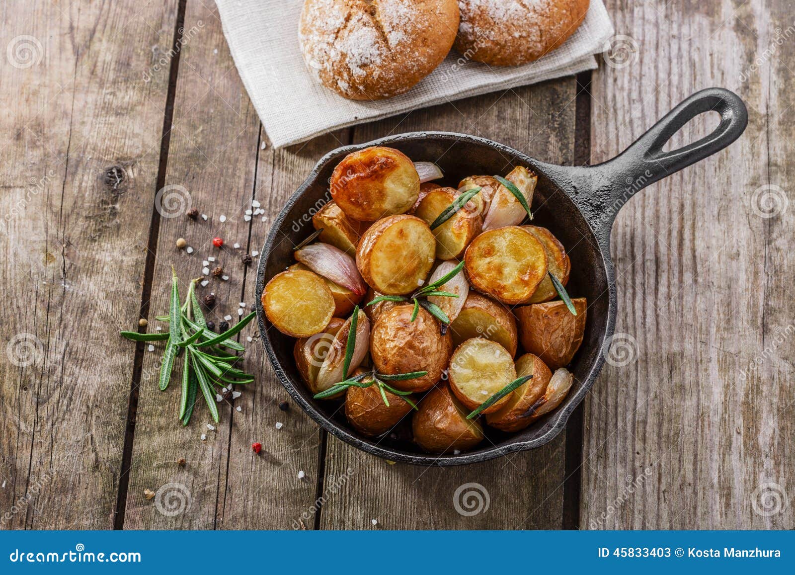 Baked potatoes in a pan stock image. Image of dish, roasted - 45833403