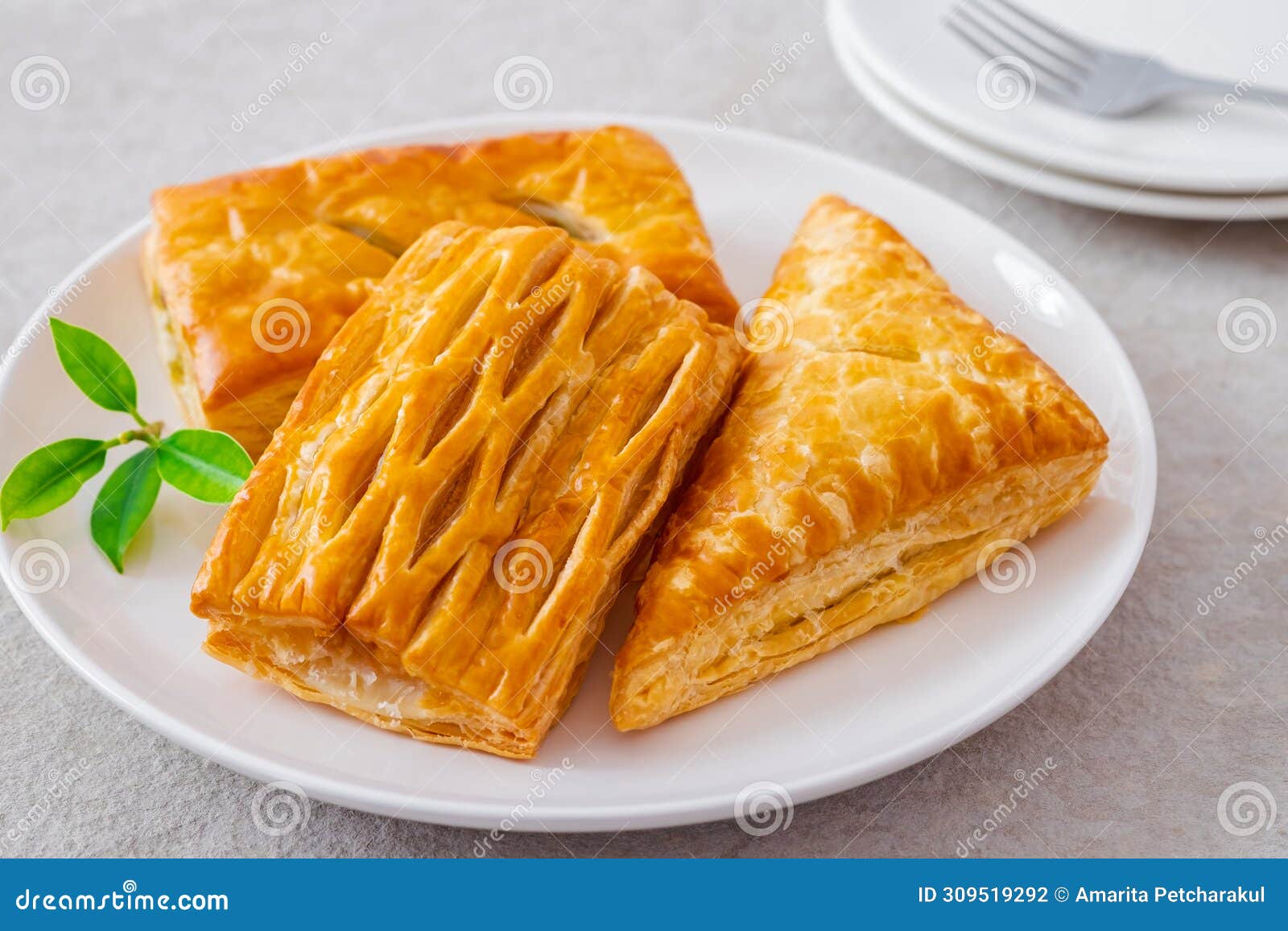 Baked Puff Pastry on White Plate Stock Photo - Image of food, bread ...