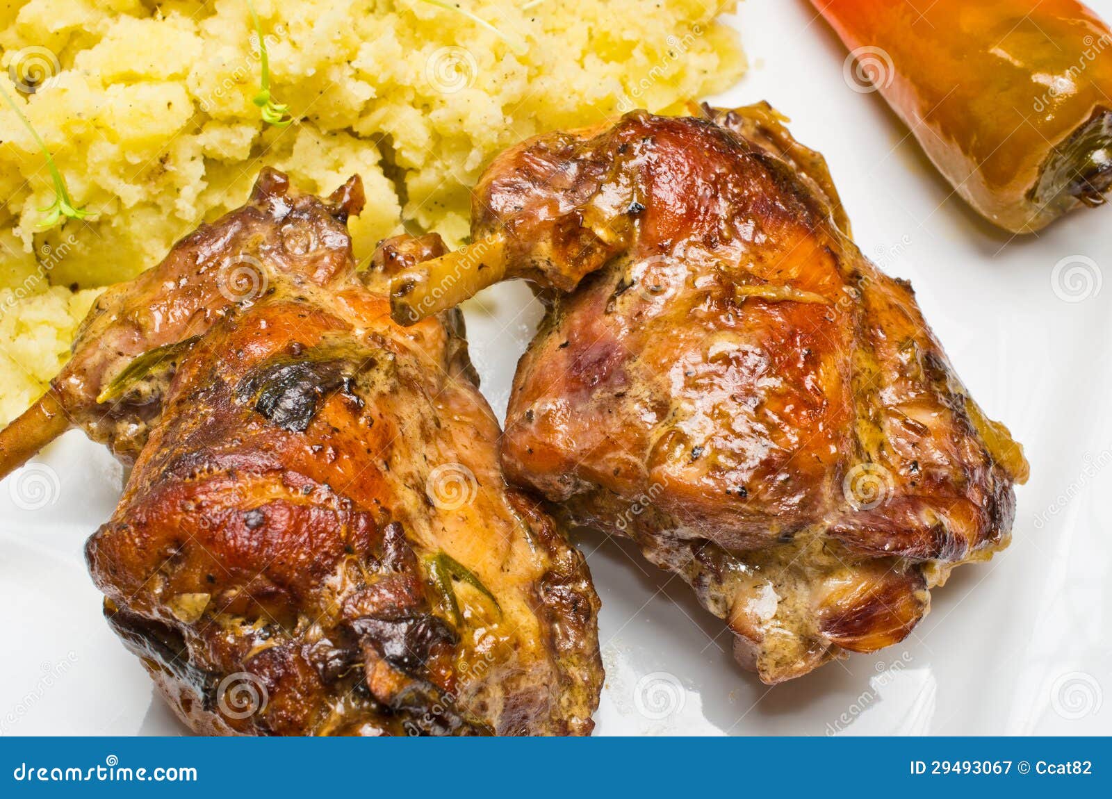 Baked rabbit with potatoes stock image. Image of pepper - 29493067