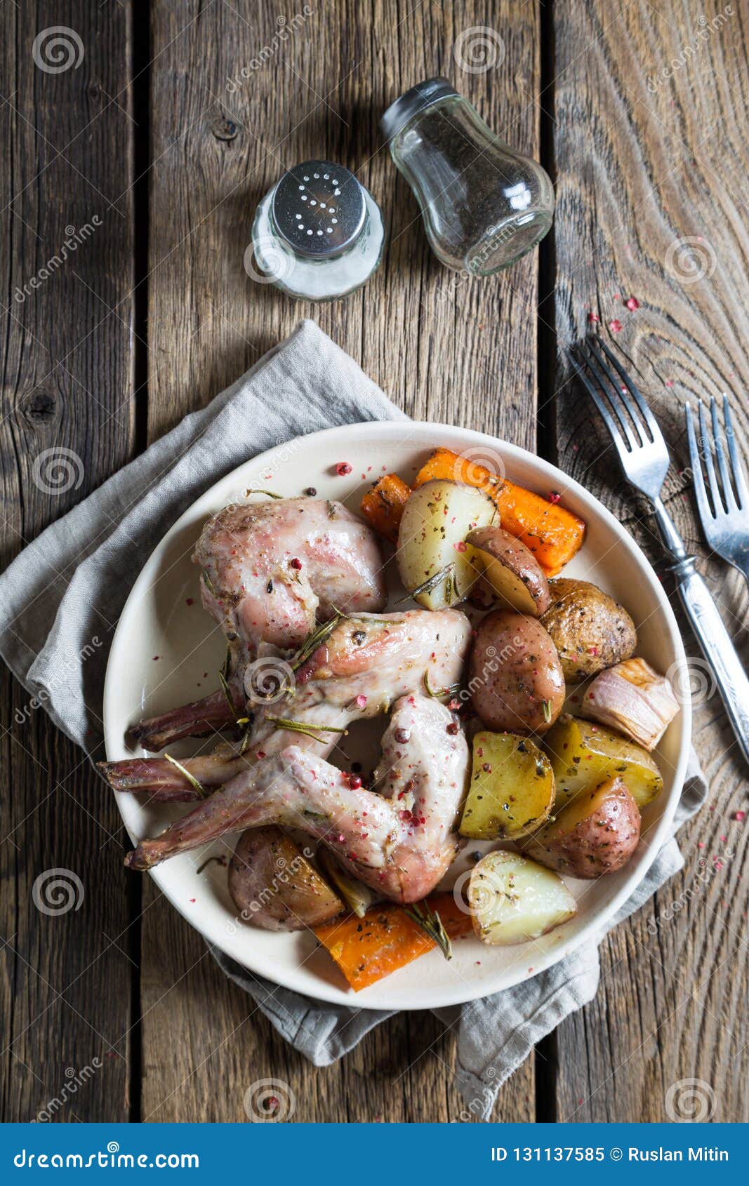Baked Rabbit with Vegetables Stock Image - Image of spatula, table ...