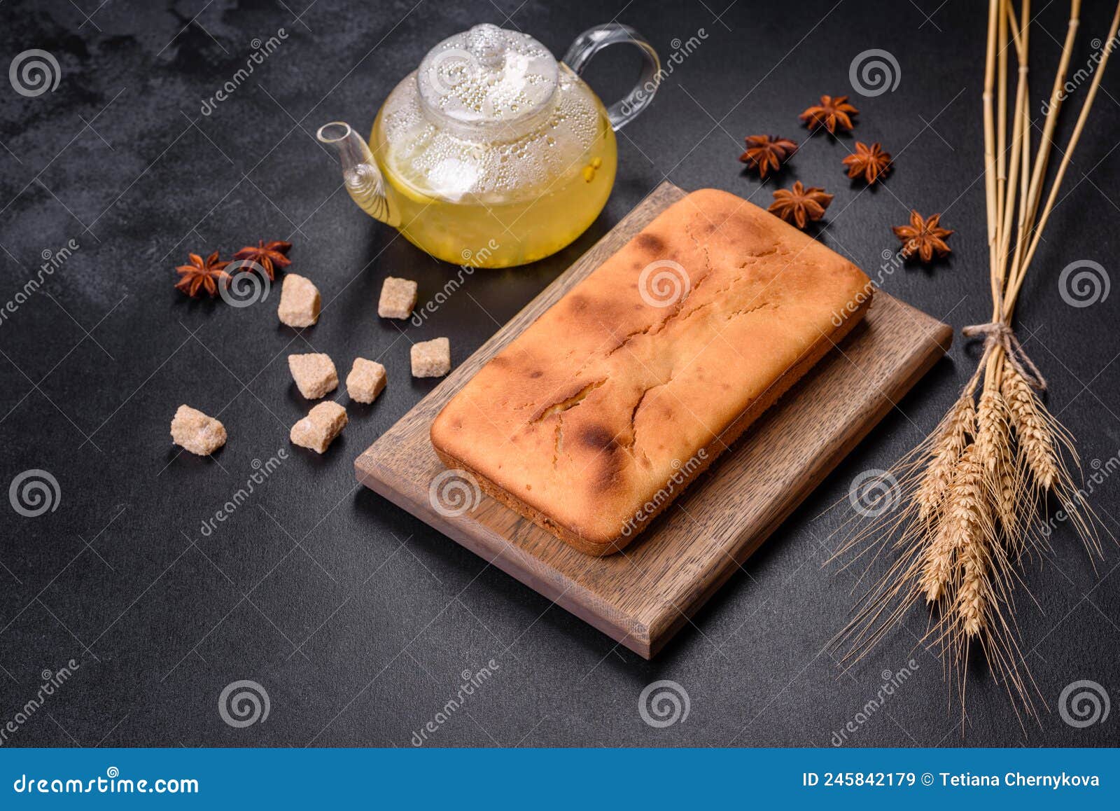 Baked Rectangular Cupcake with Raisins and Chocolate on a Dark Concrete ...