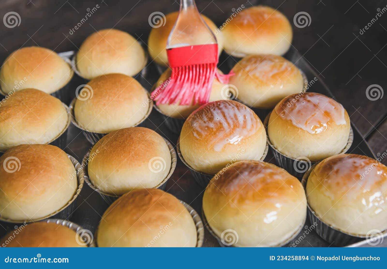 Baked Round Toasted Bread in Cups with Butter Brushing Stock Photo ...