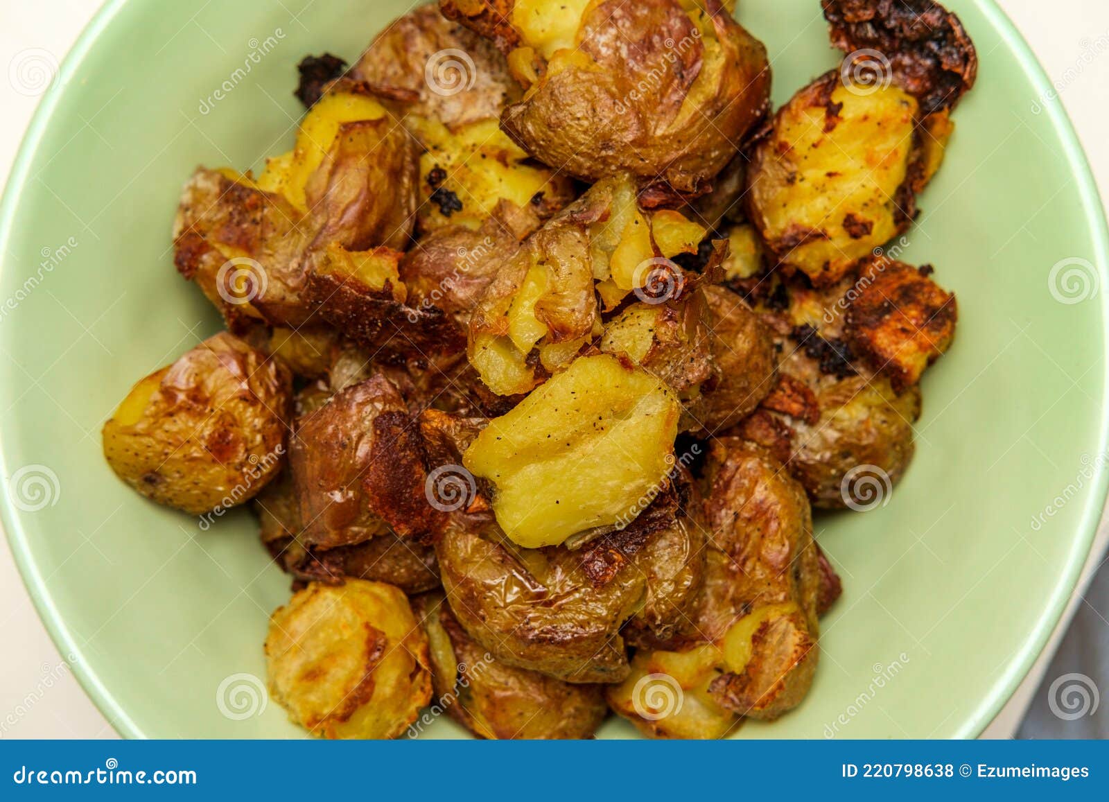 Baked Smashed Potatoes stock photo. Image of salty, homefries - 220798638
