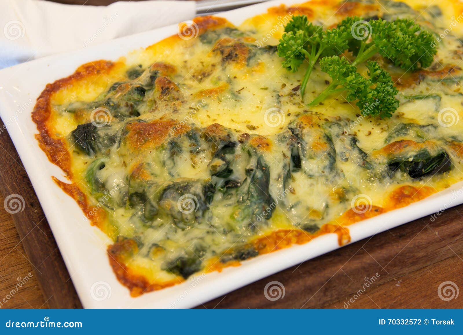 Baked spinach with cheese stock photo. Image of food - 70332572