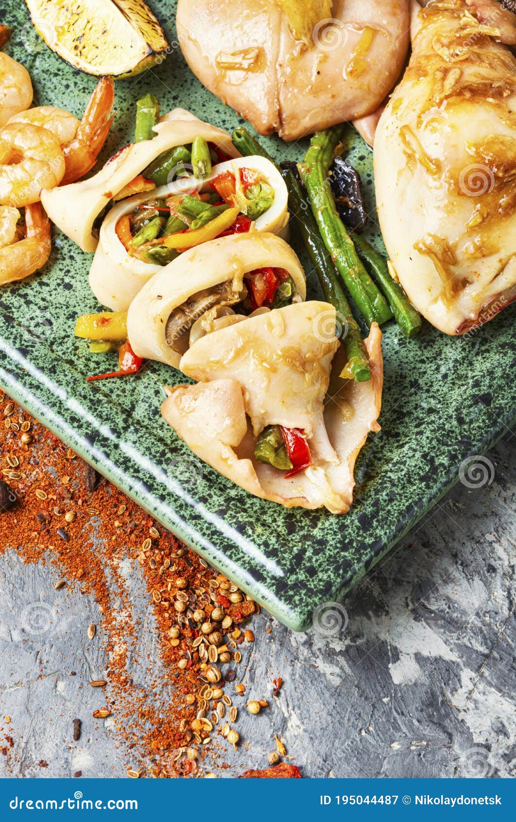 Baked squid stuffed stock image. Image of appetizer - 195044487