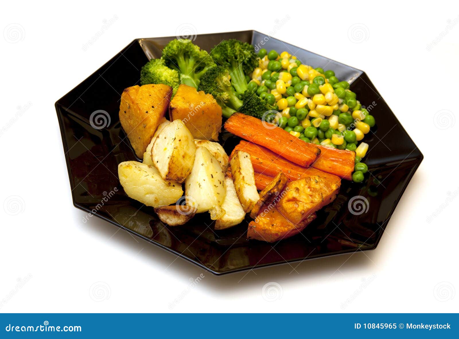 Baked Vegetables on a Black Plate Stock Image - Image of baked, diet ...
