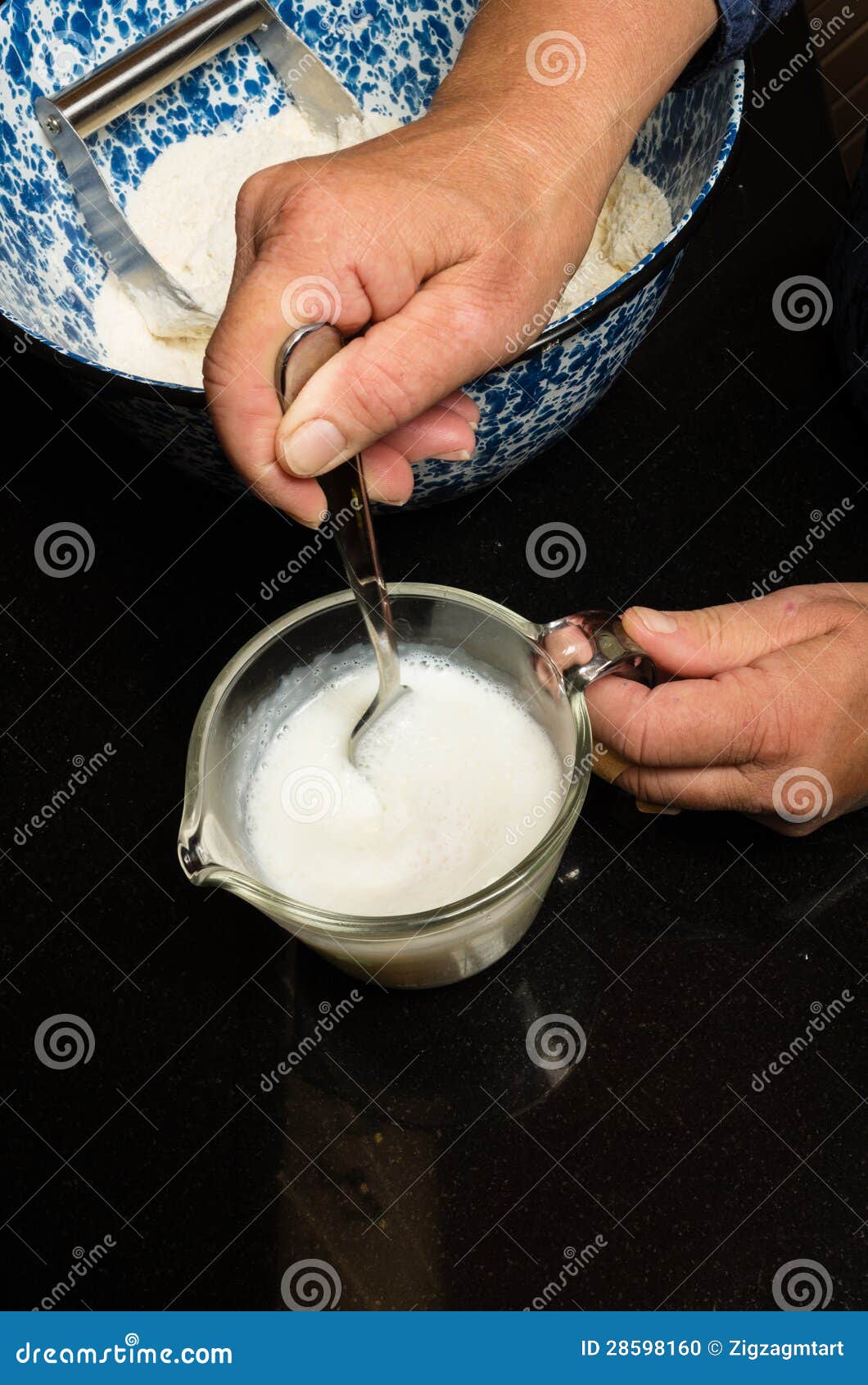 Baker Adding Ingredients To Mixing Bowl Stock Photo - Image of cook ...