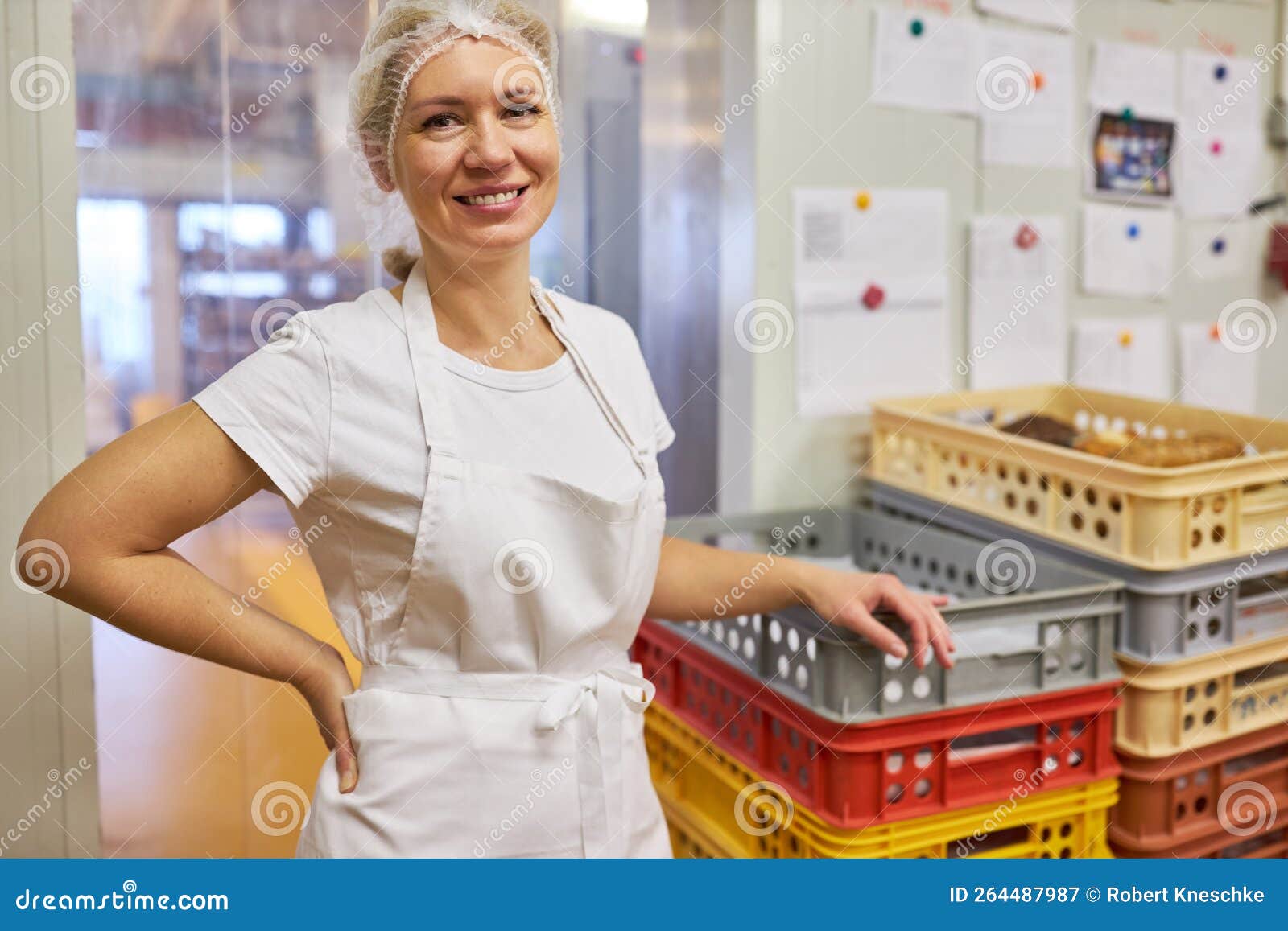 Baker Apprentice in Training Stands Next To Stack of Boxes Stock Image ...