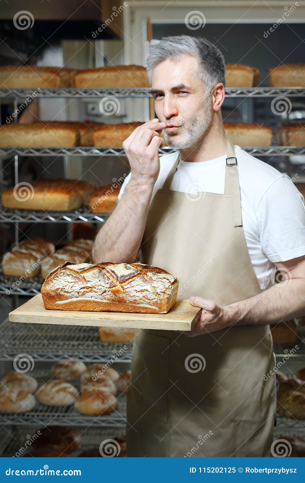 Baker in the bakery stock image. Image of tradition - 115202125