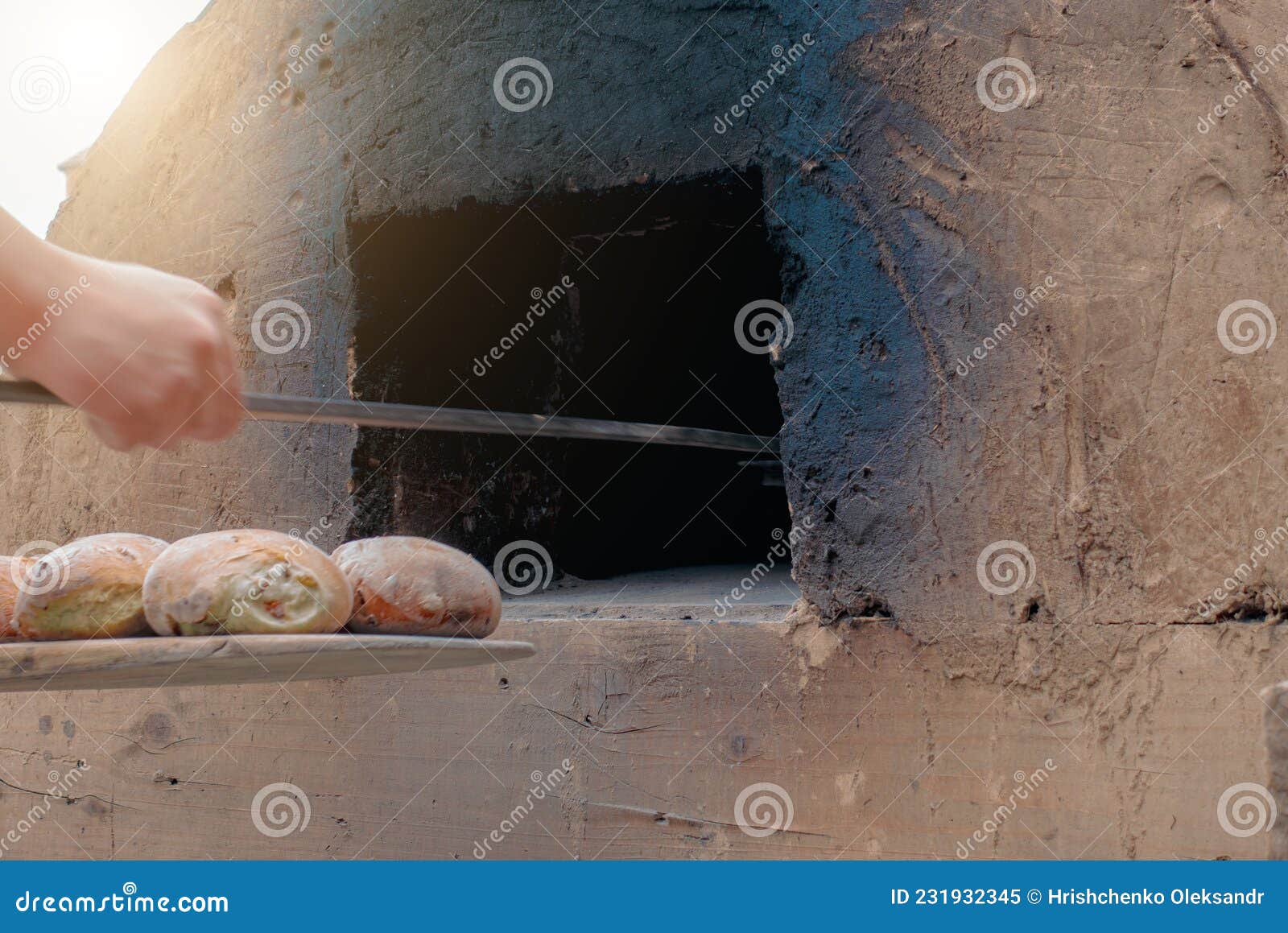 Baker Bakes Bread in an Clay Oven Stock Image - Image of heat, flame ...