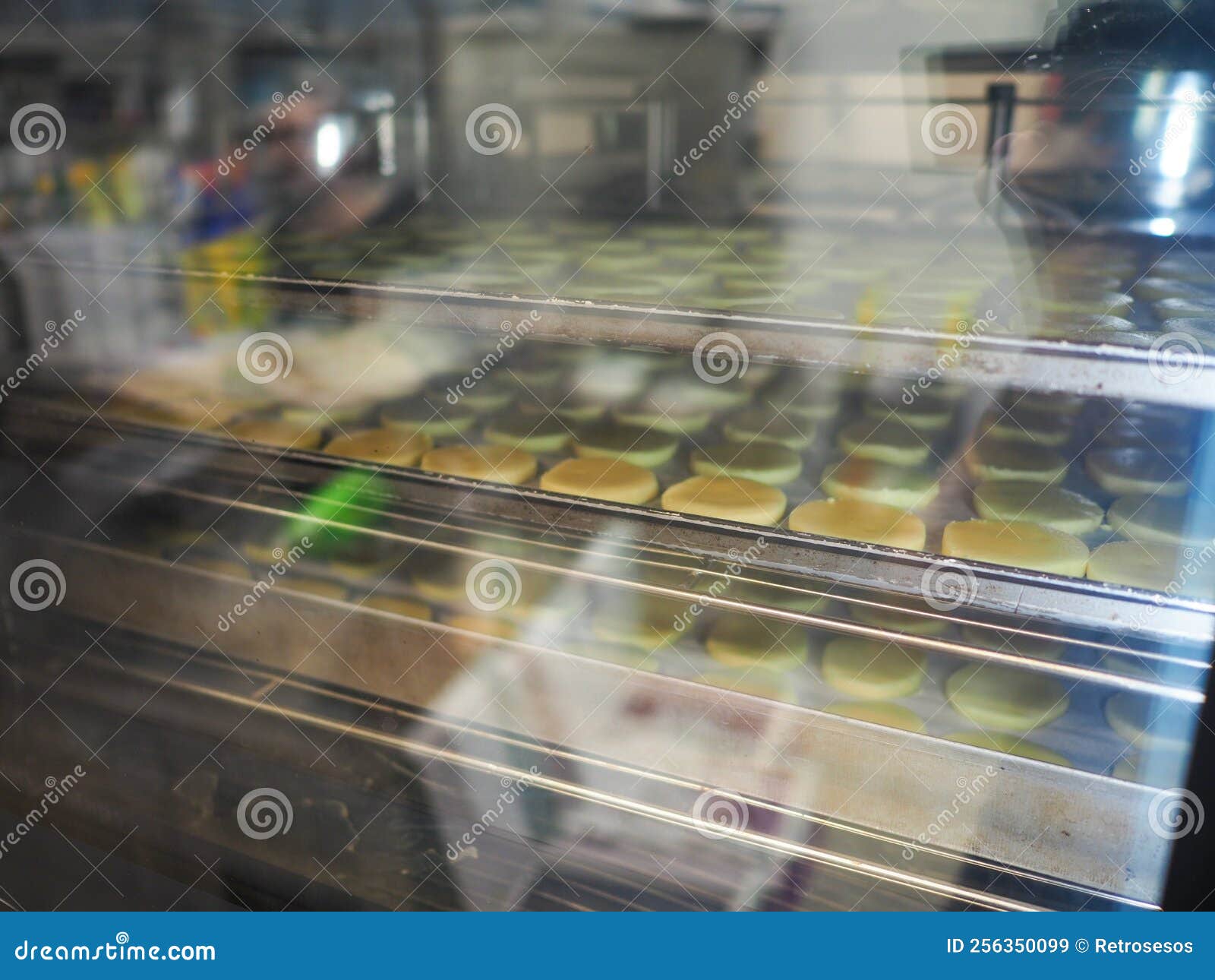 Baking a Large Group of Cookies in a Professional Oven in a Cake Lab ...