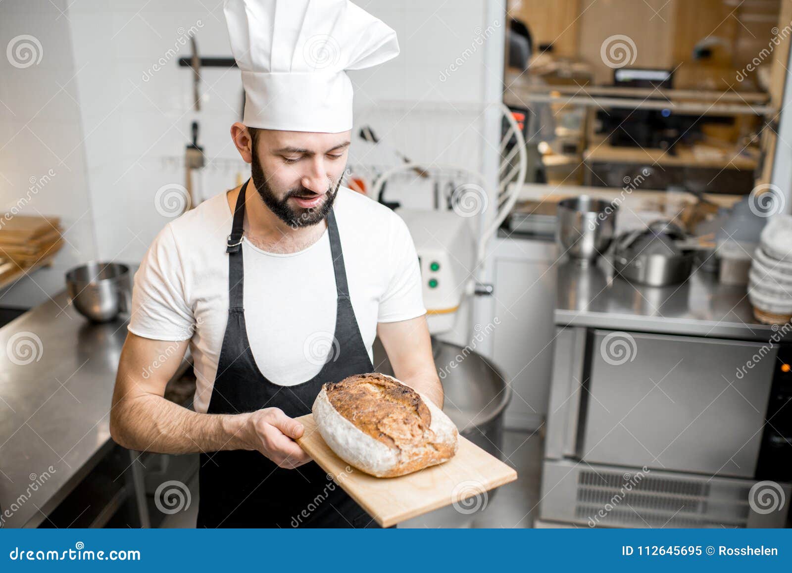 Baker with Bread in the Bakery Stock Image - Image of food, brown ...