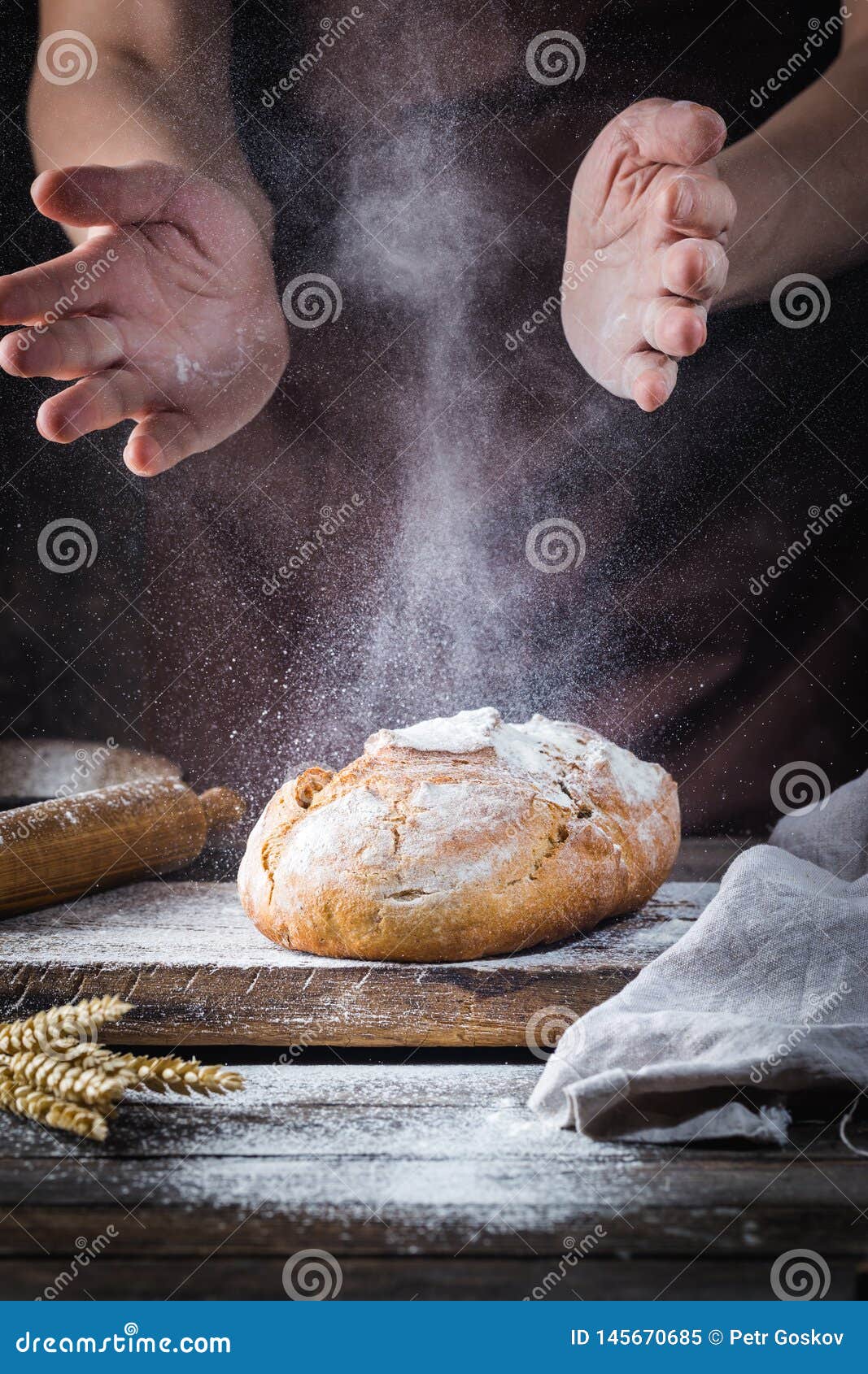 Baker cooking bread. stock image. Image of food, bake - 145670685
