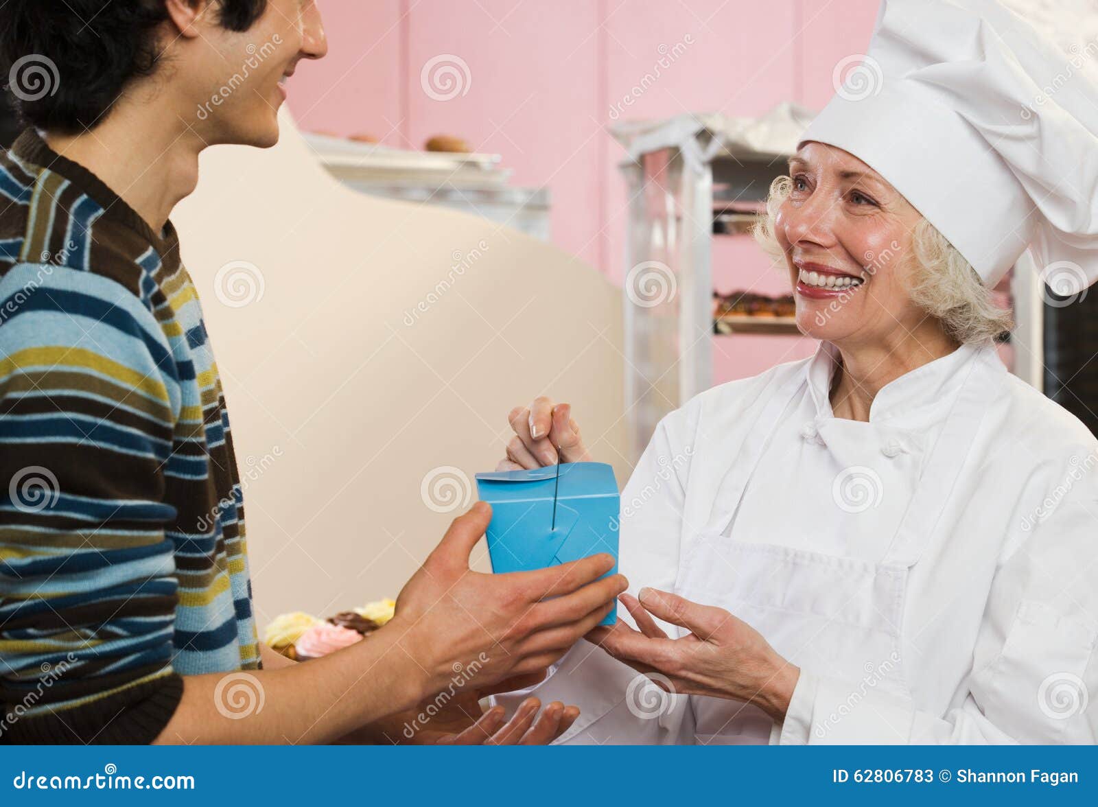 Baker and customer stock image. Image of indoors, cater - 62806783