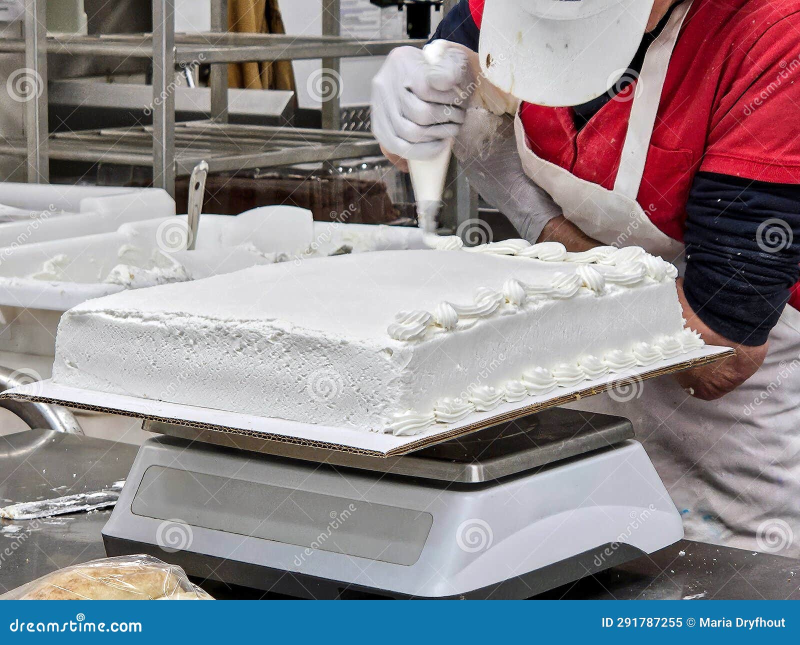 Baker Decorating a White Sheet Cake Stock Image - Image of female ...