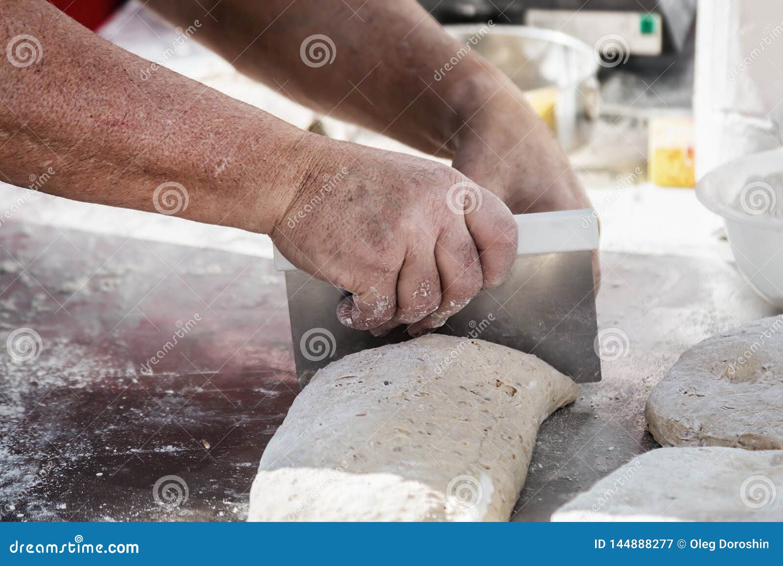 Baker Divides the Dough into Portions for Baking Bread Stock Image ...