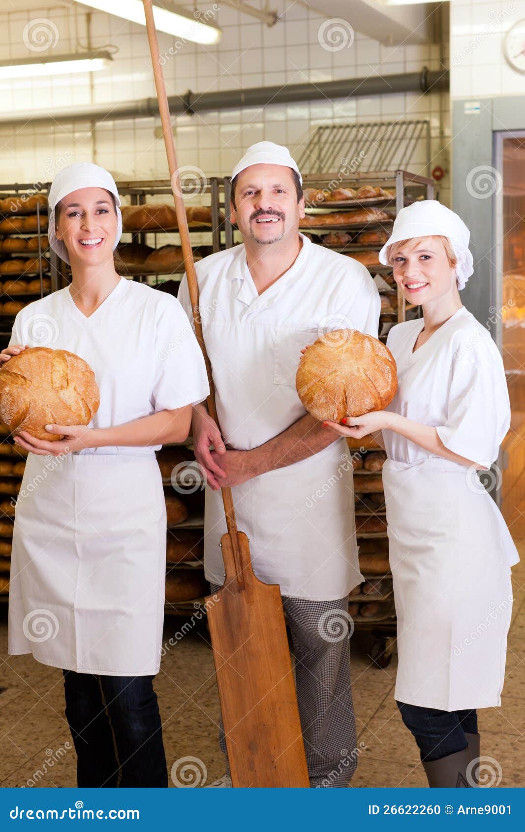Baker with His Team in Bakery Stock Photo - Image of fresh, boss: 26622260