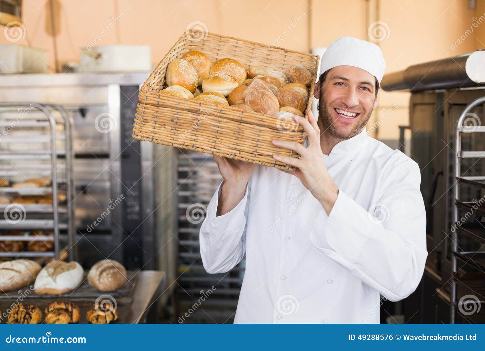 Baker Holding Basket of Bread Stock Photo - Image of profession, loaf ...