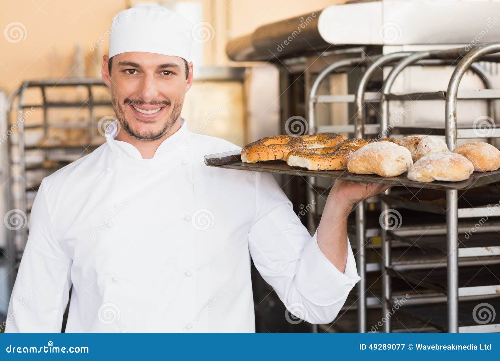 Baker Holding Tray of Bread Stock Image - Image of chefs, commercial ...