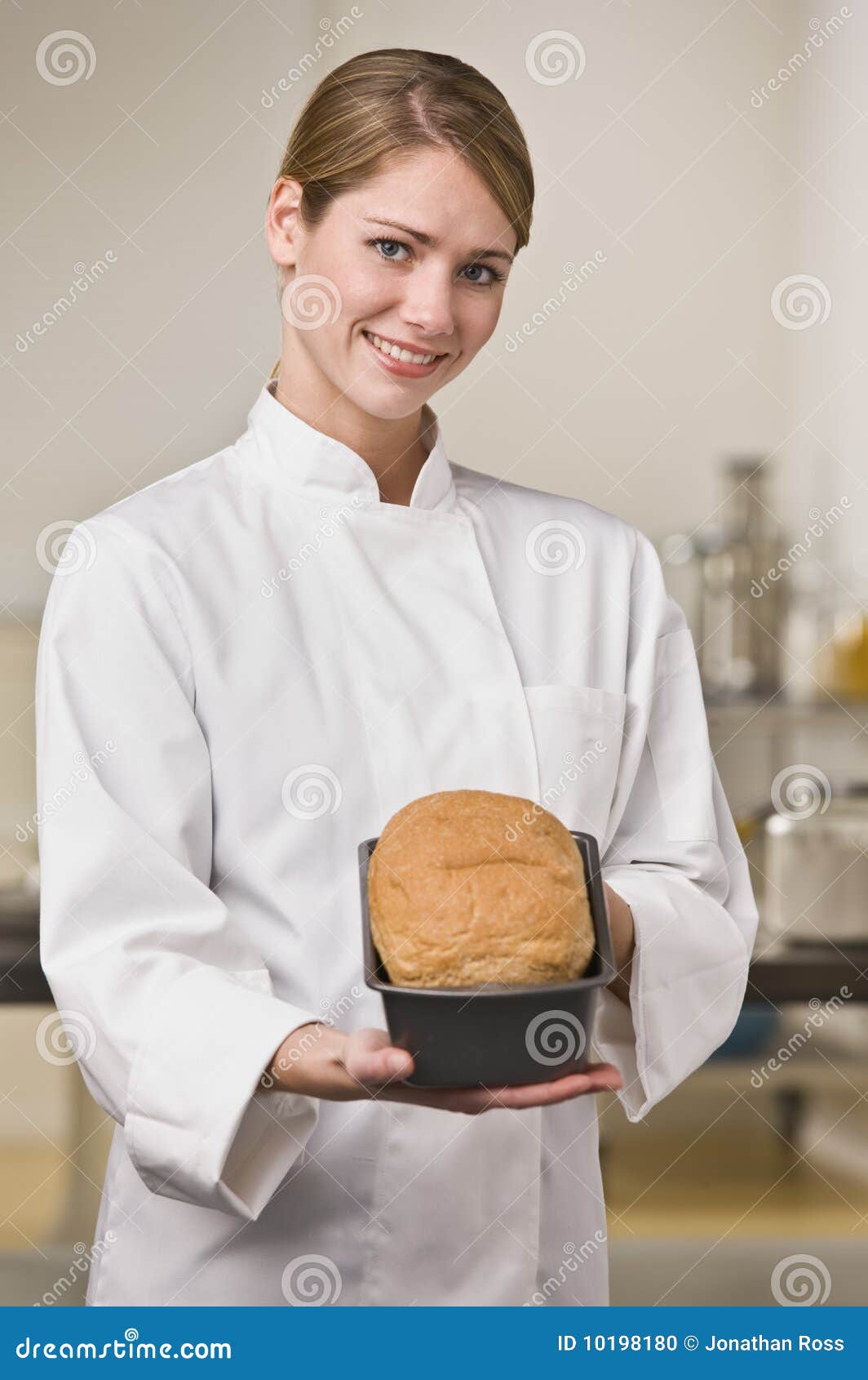 Baker with Loaf of Bread stock photo. Image of cooking - 10198180