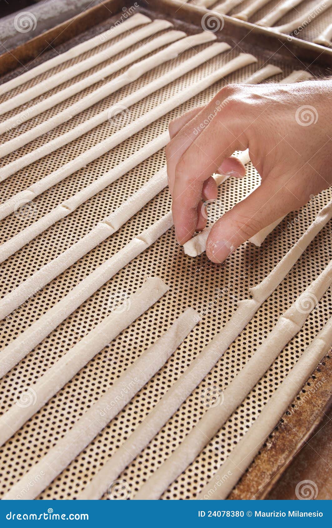 Baker Makes the Bread Sticks Stock Photo - Image of dough, cloth: 24078380