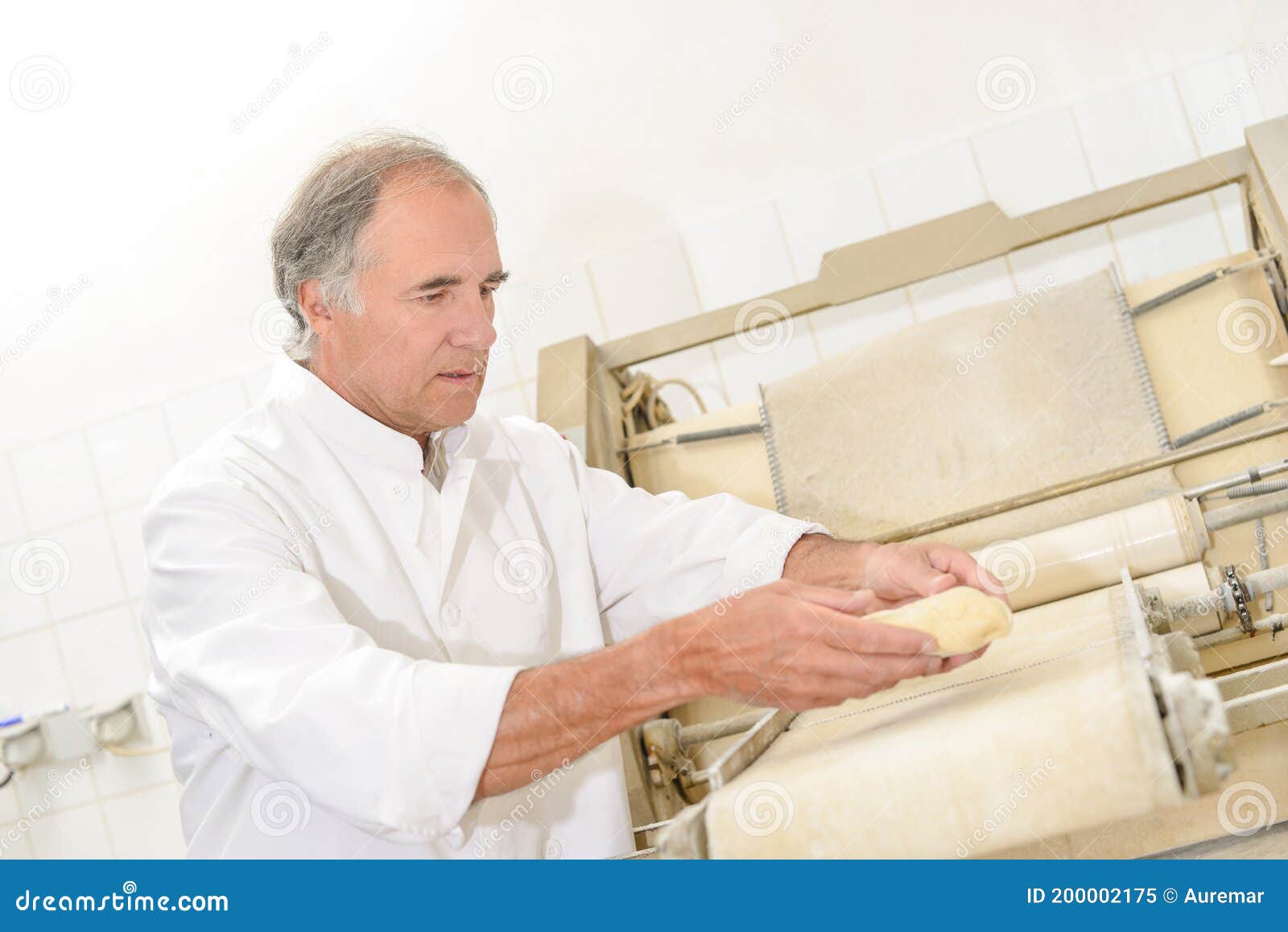Baker making bread stock image. Image of bread, profession - 200002175