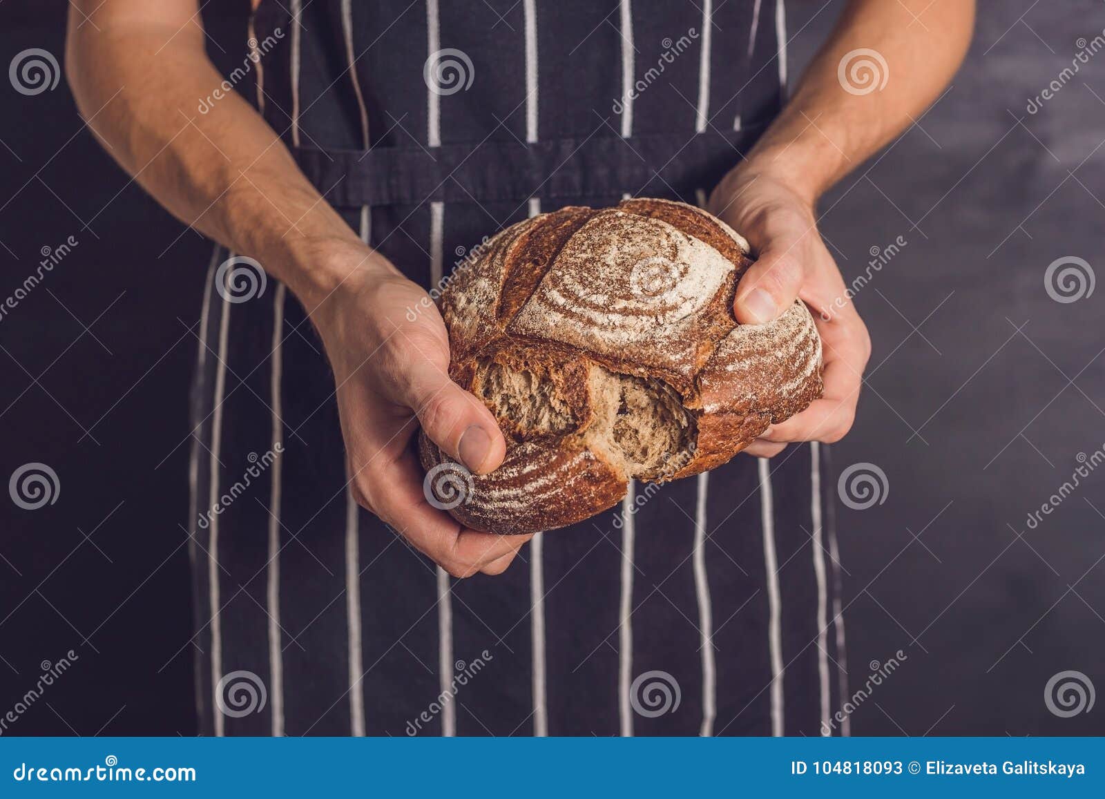 Baker Man Holding Homemade Rustic Wheat Bread in Hands. Selective Focus ...