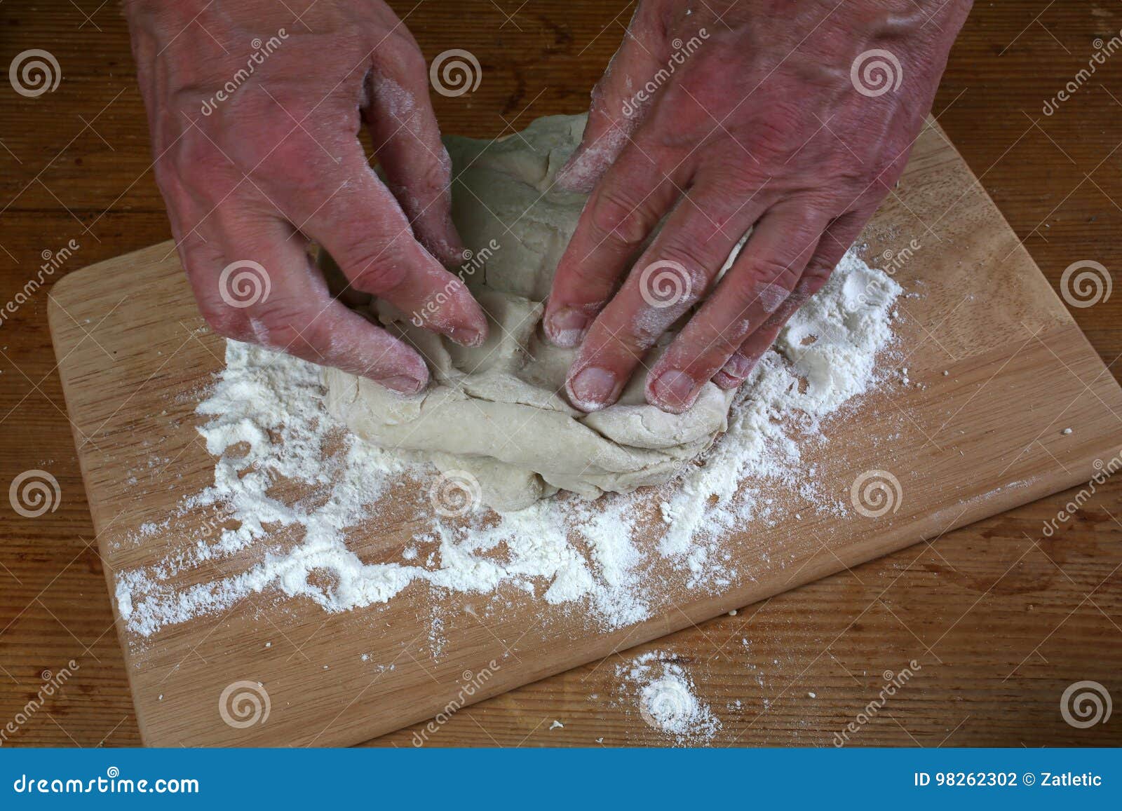 Baker Preparing Some Dough Ready To Bake Some Bread Stock Photo - Image ...