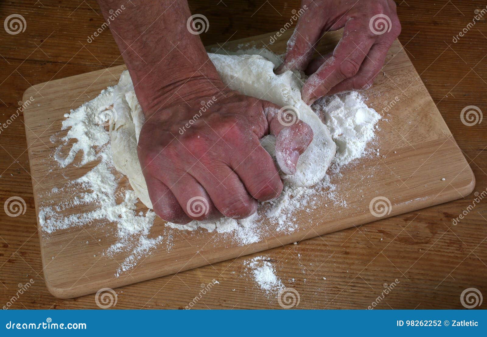 Baker Preparing Some Dough Ready To Bake Some Bread Stock Photo - Image ...