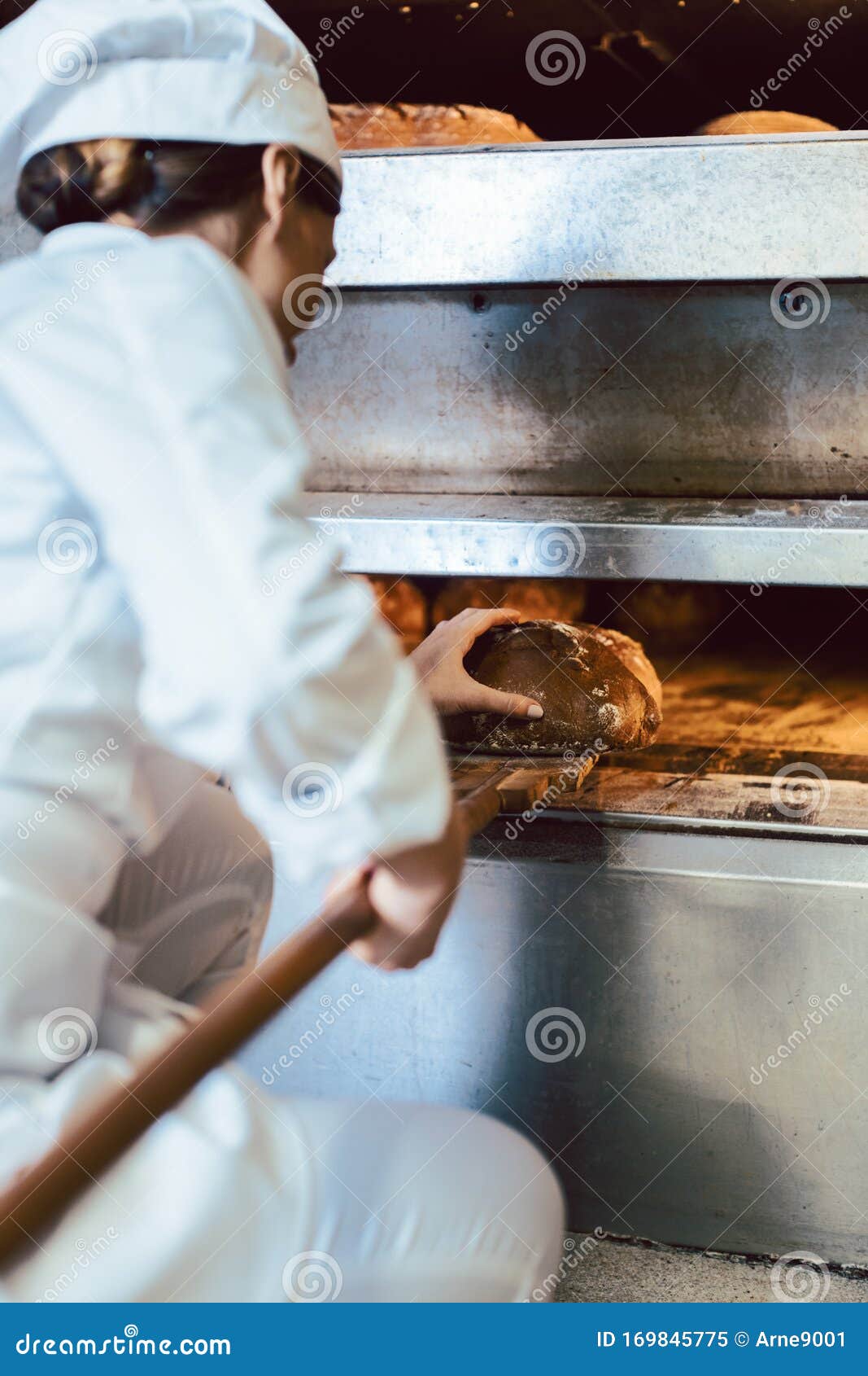 Baker Putting Bread in the Bakery Oven Stock Image - Image of ...