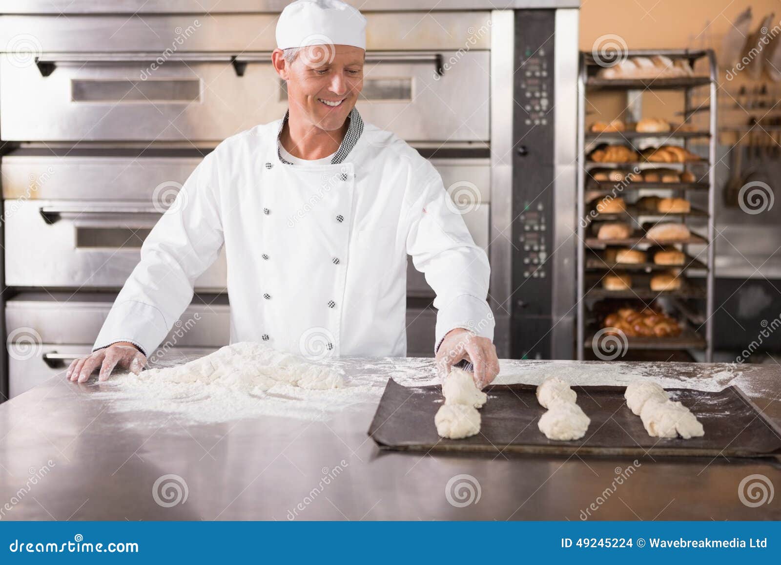 Baker Putting Dough on Baking Tray Stock Photo - Image of chef, store ...