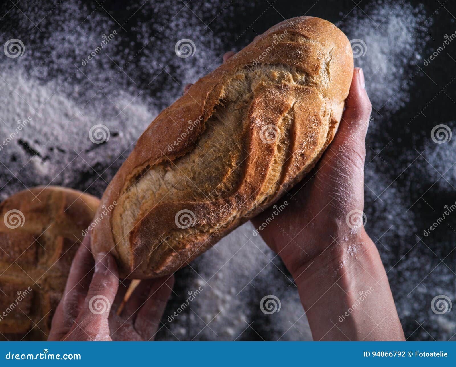 Baker`s Hands Hold Fresh Bread Stock Photo - Image of cook, cooking ...