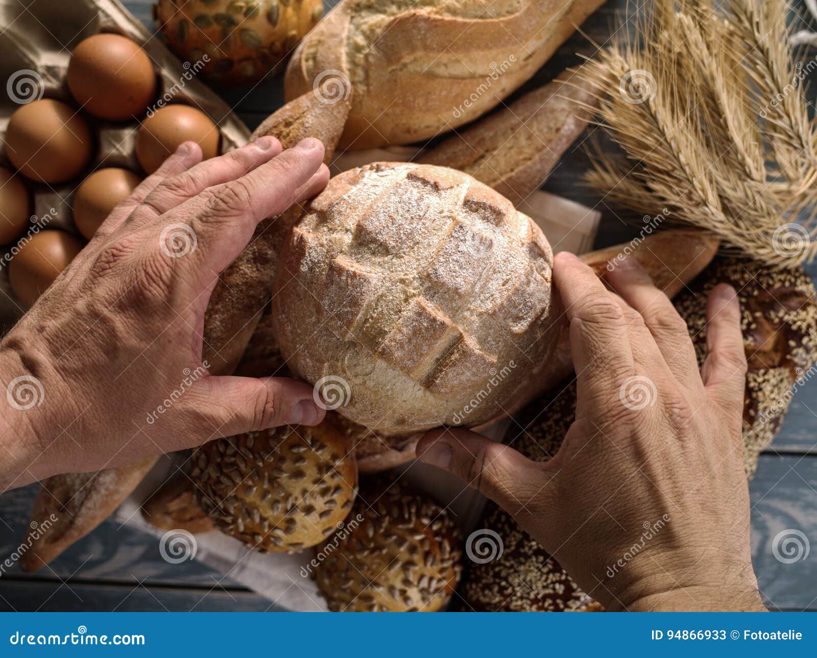 Baker`s Hands Hold Fresh Bread Stock Image - Image of food, kitchen ...