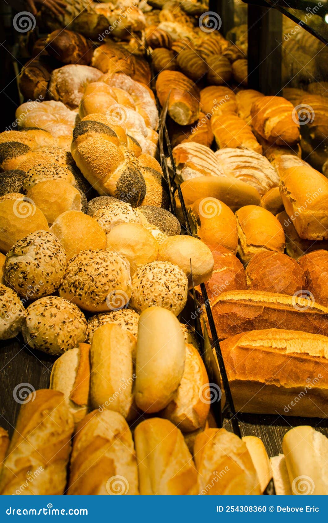 Hand of Baker or Apprentice Baker Taking Baguettes Out of Oven Stock ...