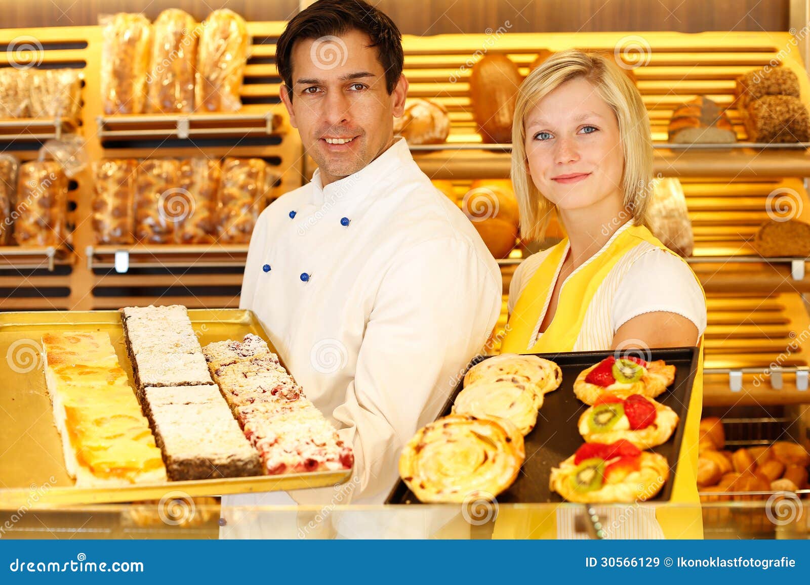 Baker and Shopkeeper Present Pastry Stock Image - Image of kitchen ...
