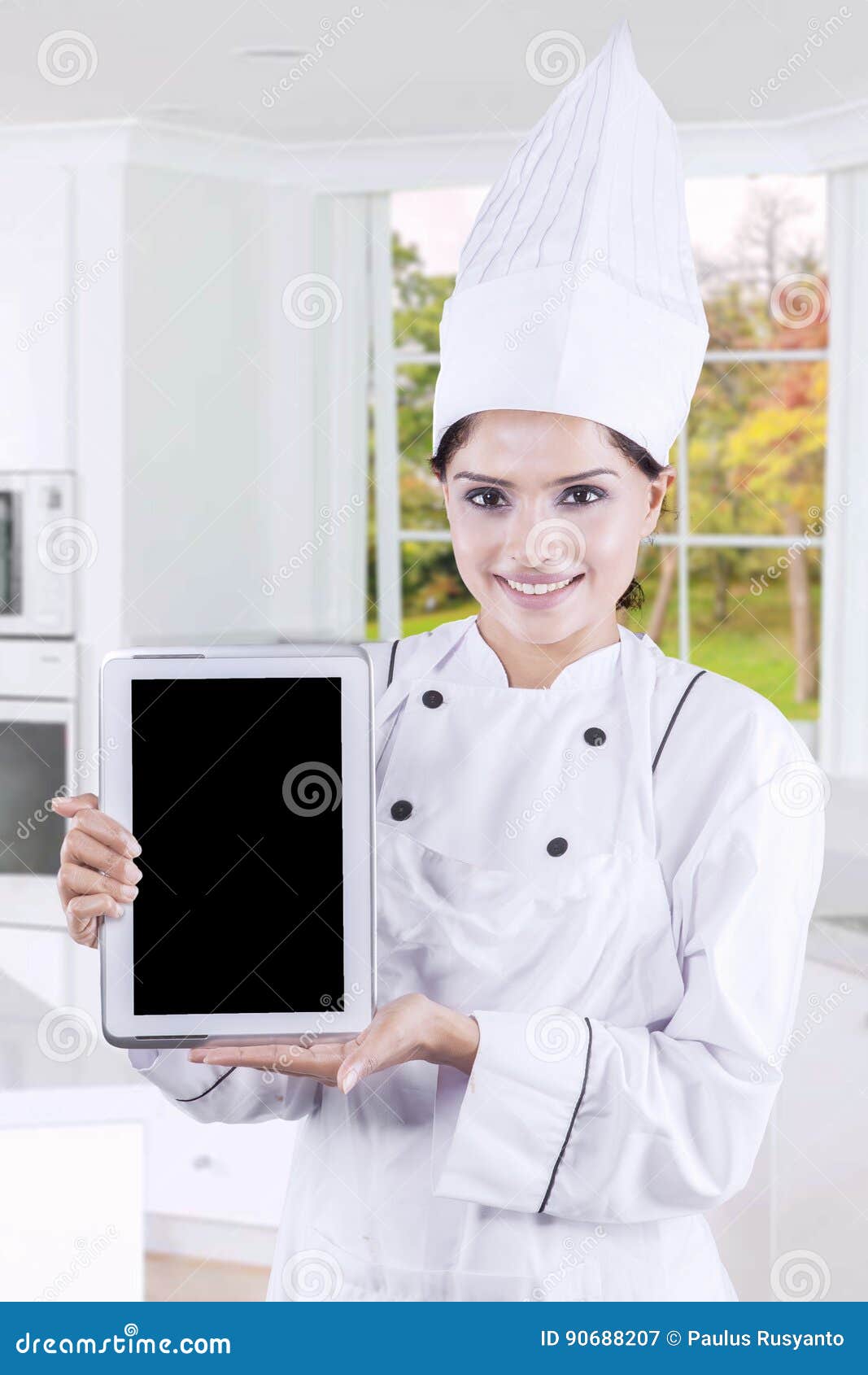 Baker Showing Empty Tablet Screen in Kitchen Stock Image - Image of ...