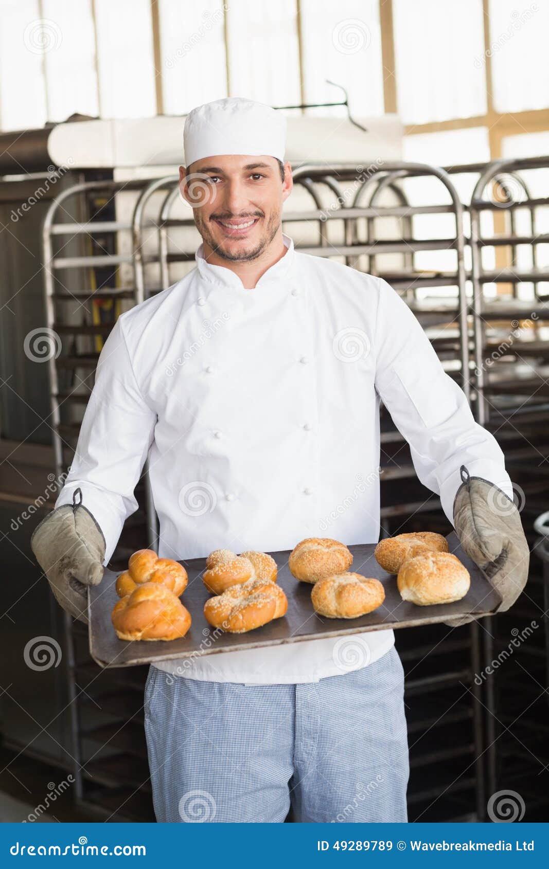 Baker Showing Tray of Rolls Stock Image - Image of industry, commercial ...
