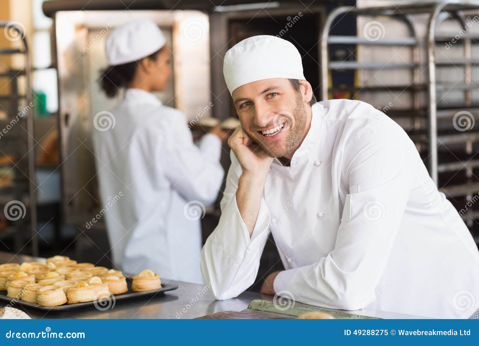 Baker Smiling at the Camera Stock Image - Image of baker, mixedrace ...