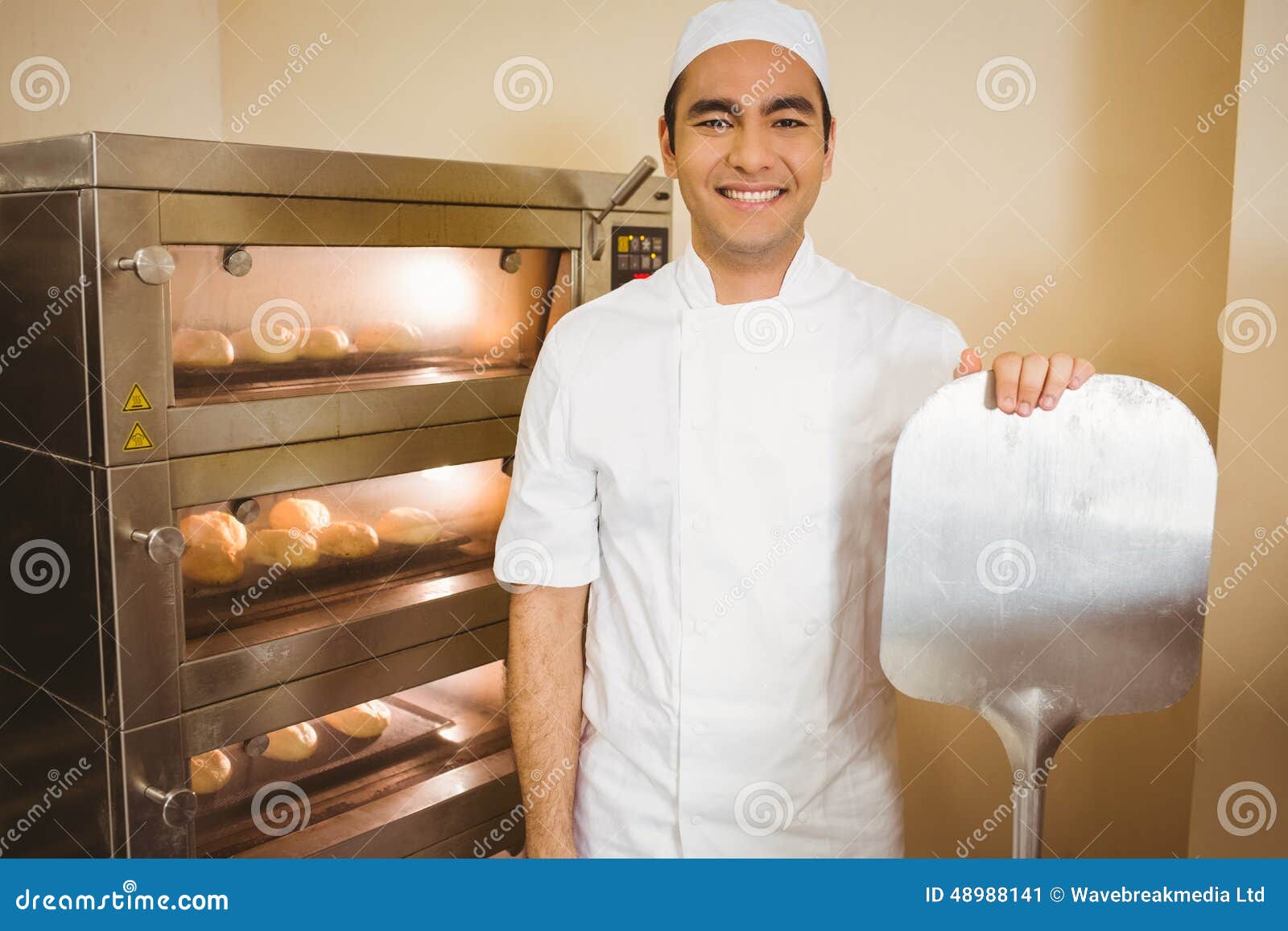 Baker Smiling at Camera beside Oven Stock Image - Image of school, view ...