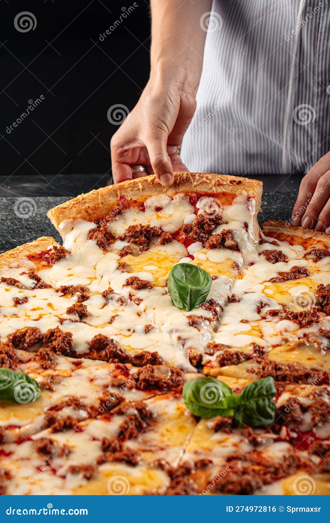 Baker Taking Off a Slice of Pizza with Minced Beef Stock Photo - Image ...
