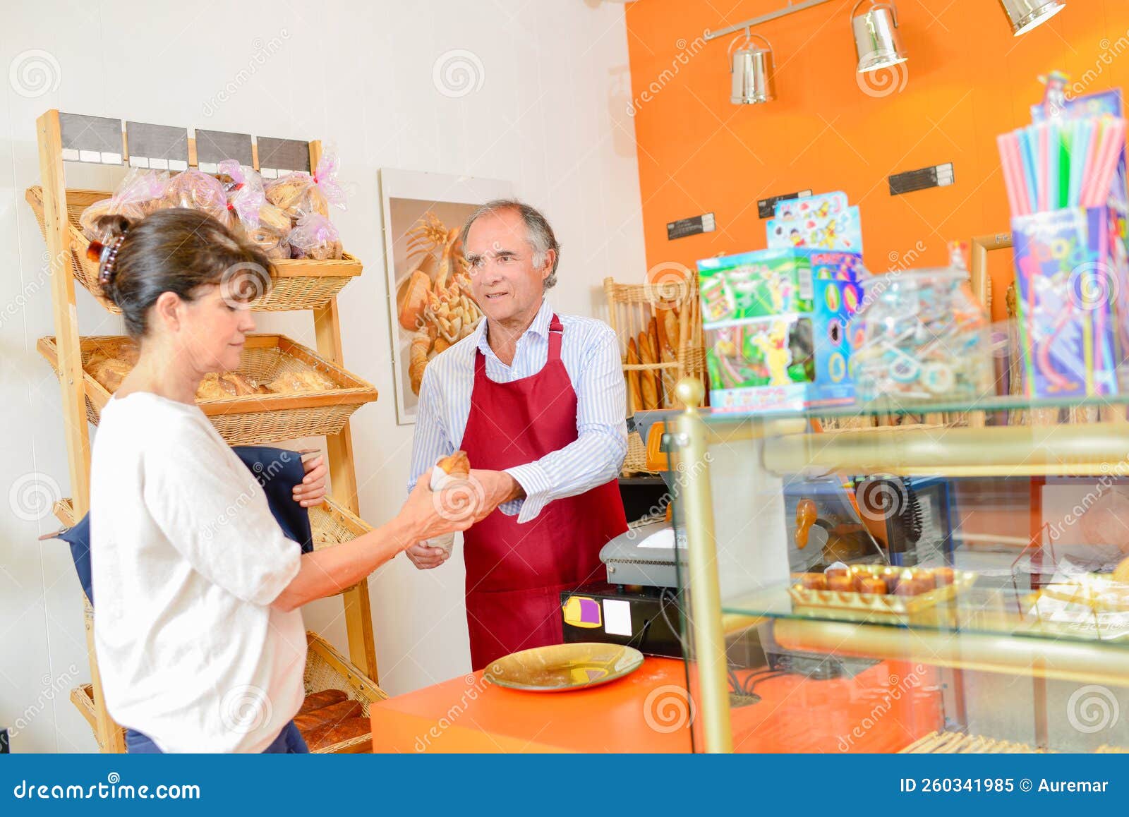 Baker talking to customer stock image. Image of handsome - 260341985