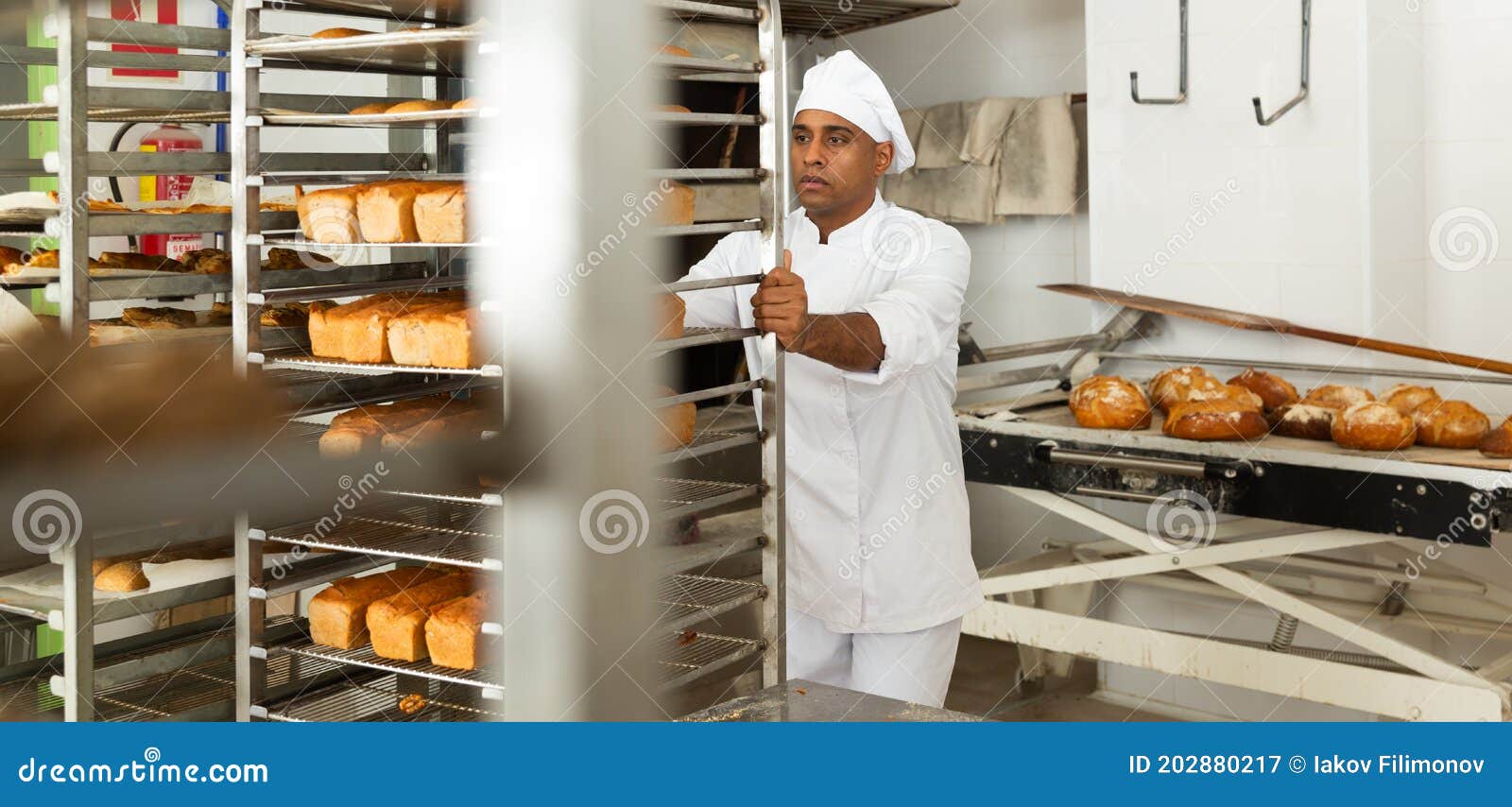 Baker Transporting Hot Bread Cart Stock Image - Image of commerce, loaf ...