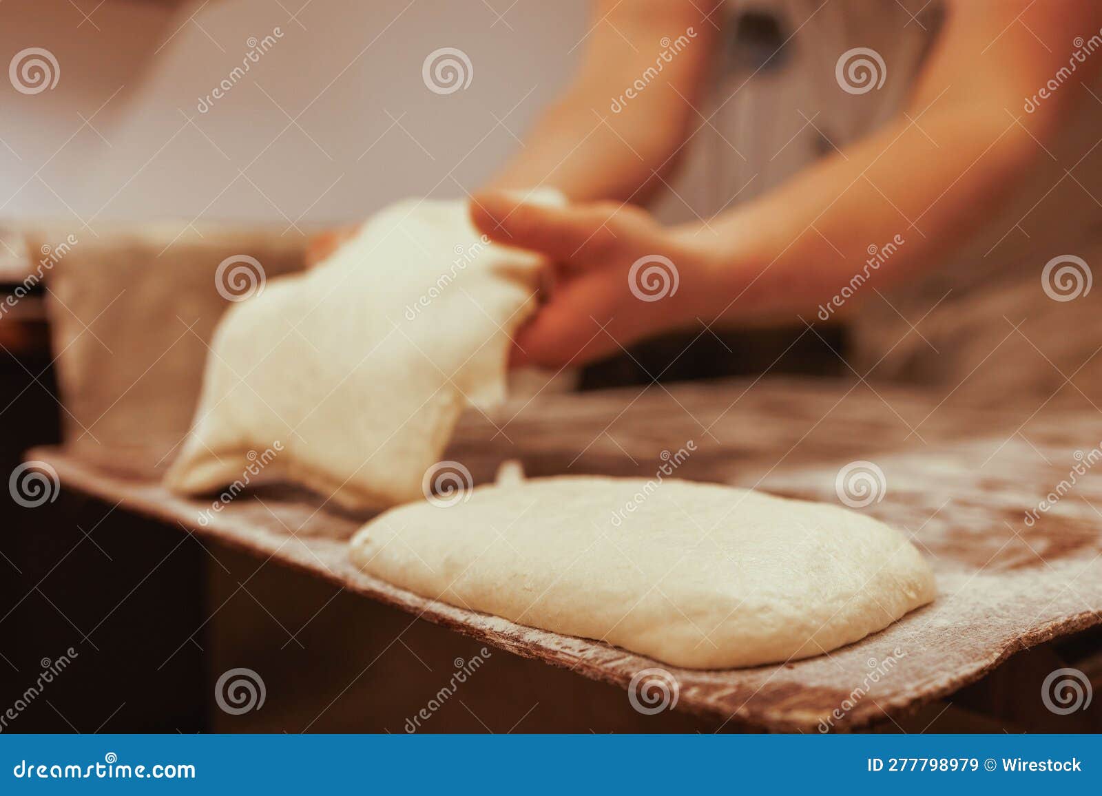 Baker Working in the Kitchen, Preparing Loaves of Bread Stock Image ...