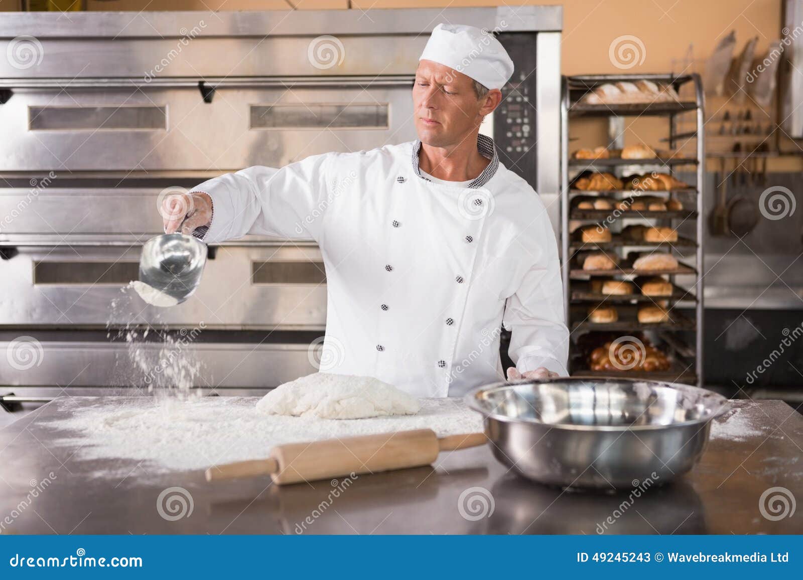 Baker Working With Flour And Sieve, Kneading Dough. Man Muscular Baker ...