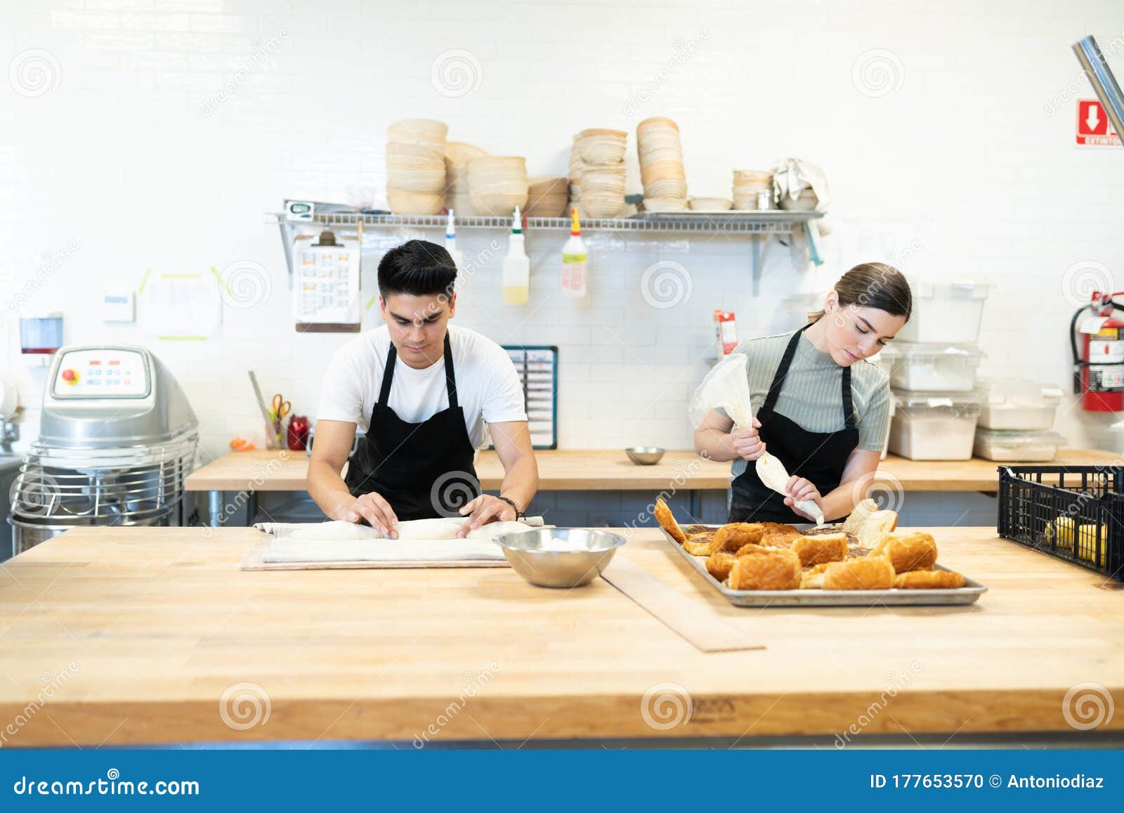 Bakers Busy at Work in a Bakery Stock Photo - Image of focused, adult ...